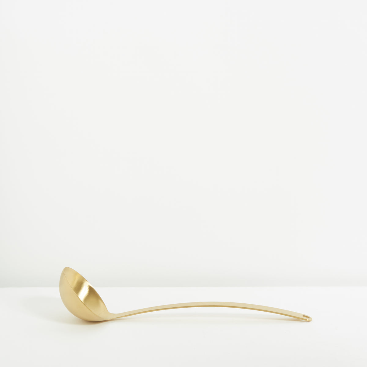Brush gold metal ladle – The Prop Bank